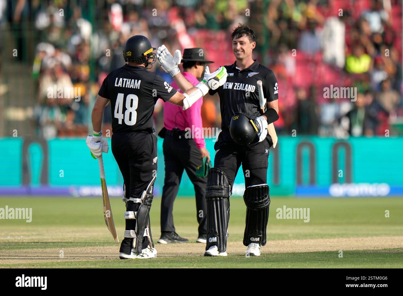 New Zealand's Will Young, right, celebrates with Tom Latham after ...