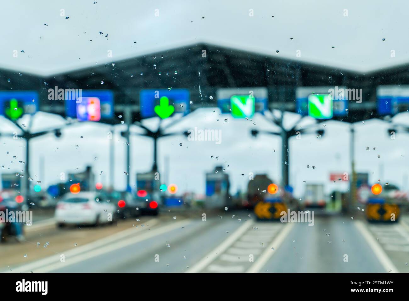 The view of customs checkpoint for cars from inside of the bus in a ...