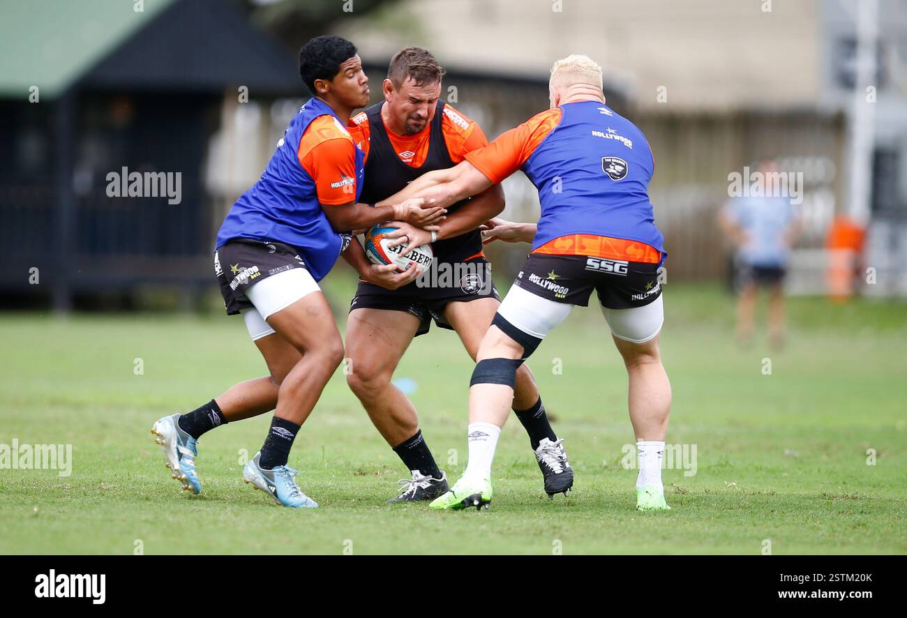 Bradley Davids of the Hollywoodbets Sharks and Vincent Koch of the Hollywoodbets Sharks tackling ...