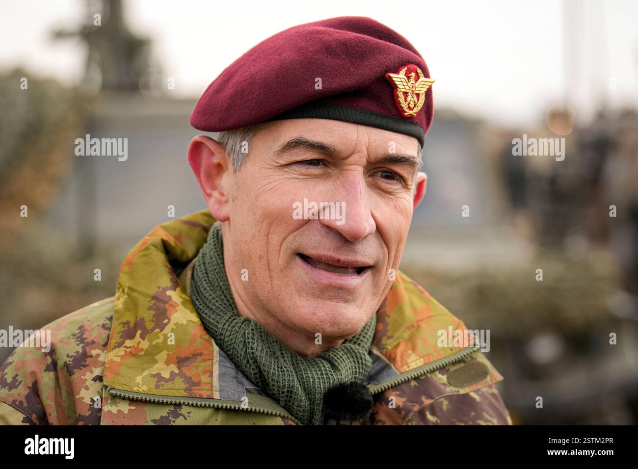 Major General Lorenzo D'Addario of the Italian army forces speaks to ...