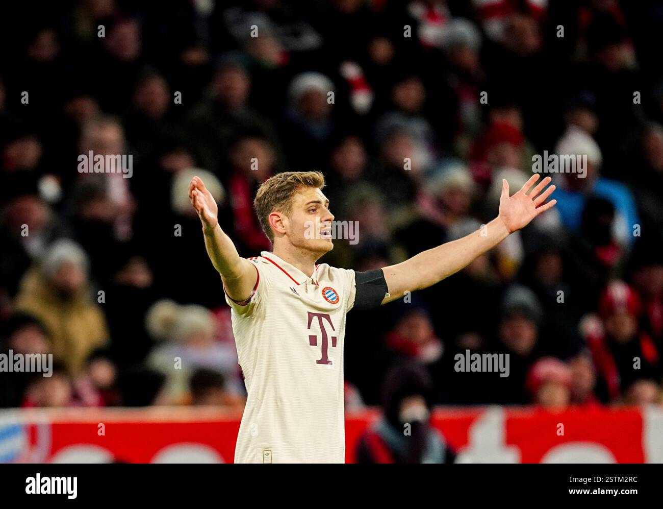 February 18 2025: Josip Stanisic of Bayern Munich gestures during a ...