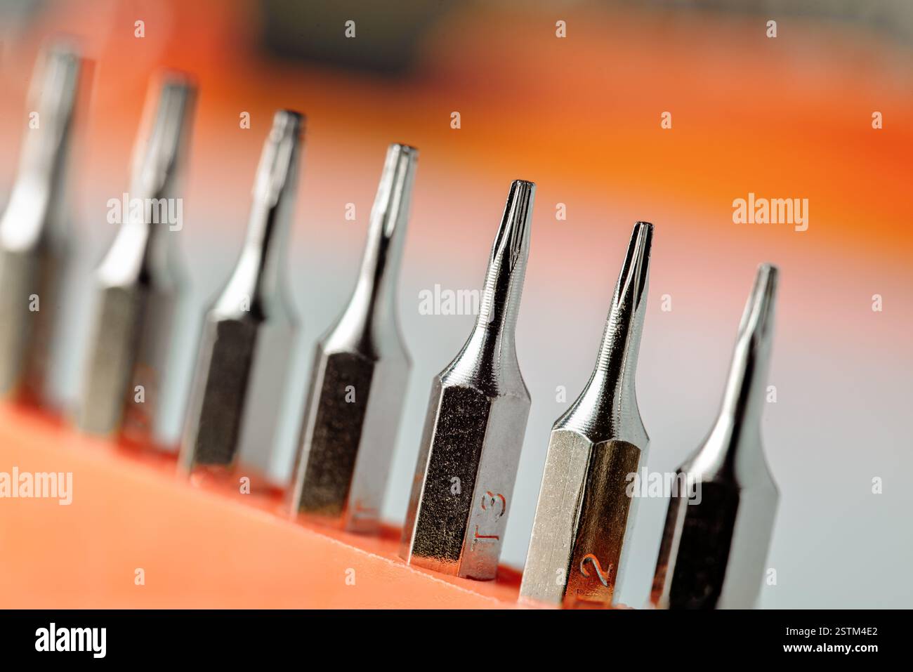 Detail of torx magnetic precision screwdriver bits on white background ...
