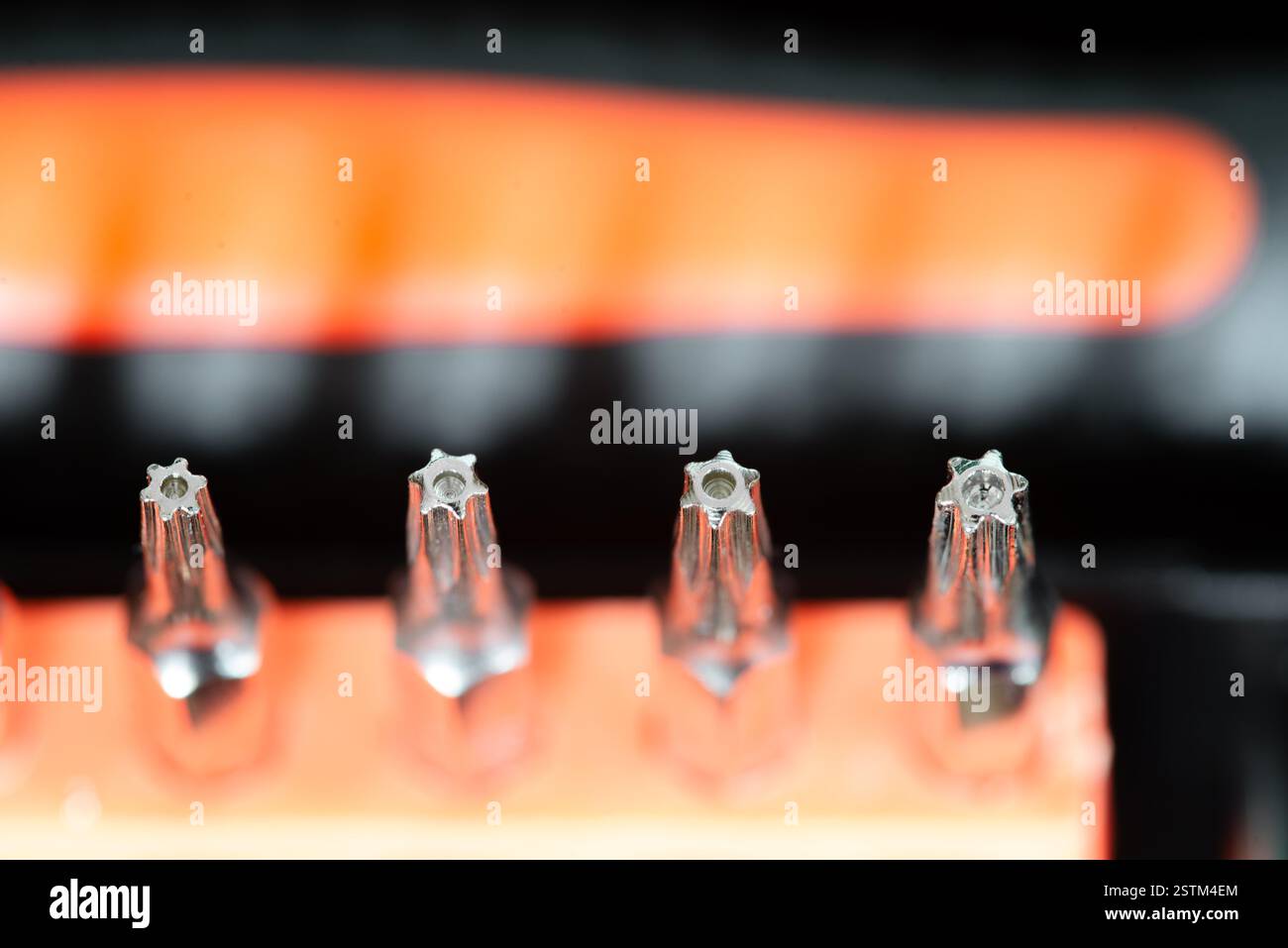 Detail of torx security magnetic precision screwdriver bits on white ...