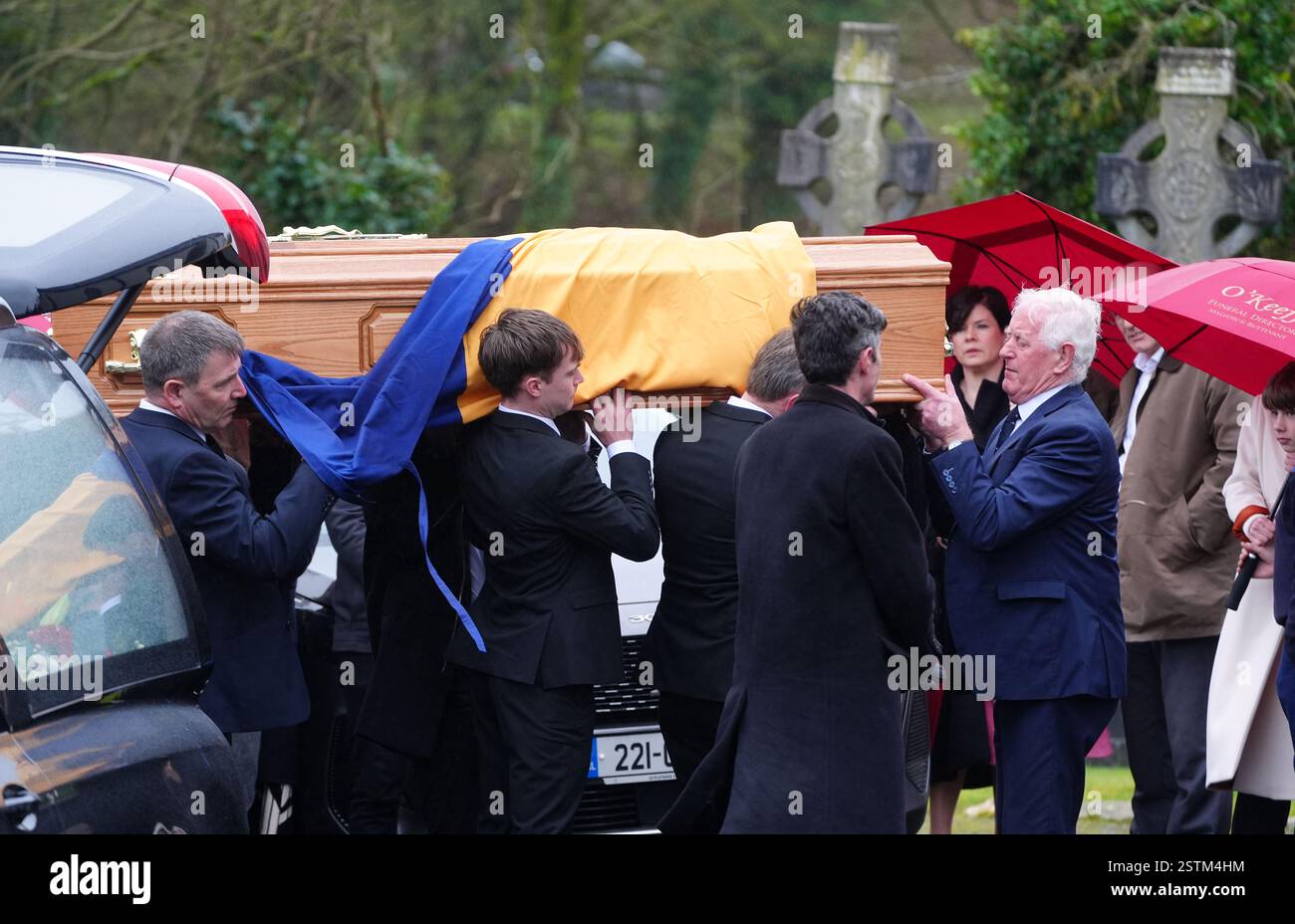 The coffin of Michael O'Sullivan is carried into the St John the ...