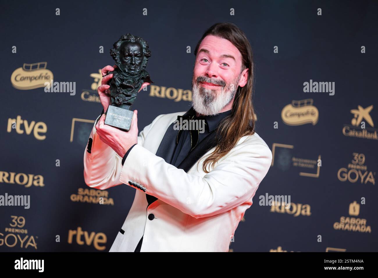 Granada, Spain. 8th February 2025. Javier Alvariño holds the Goya Award ...