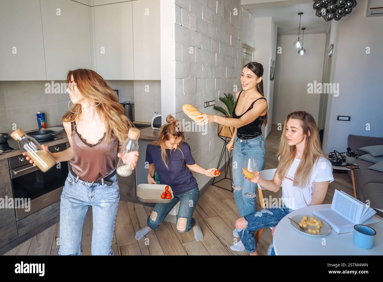 Cheerful group women dance in hi-res stock photography and images - Alamy