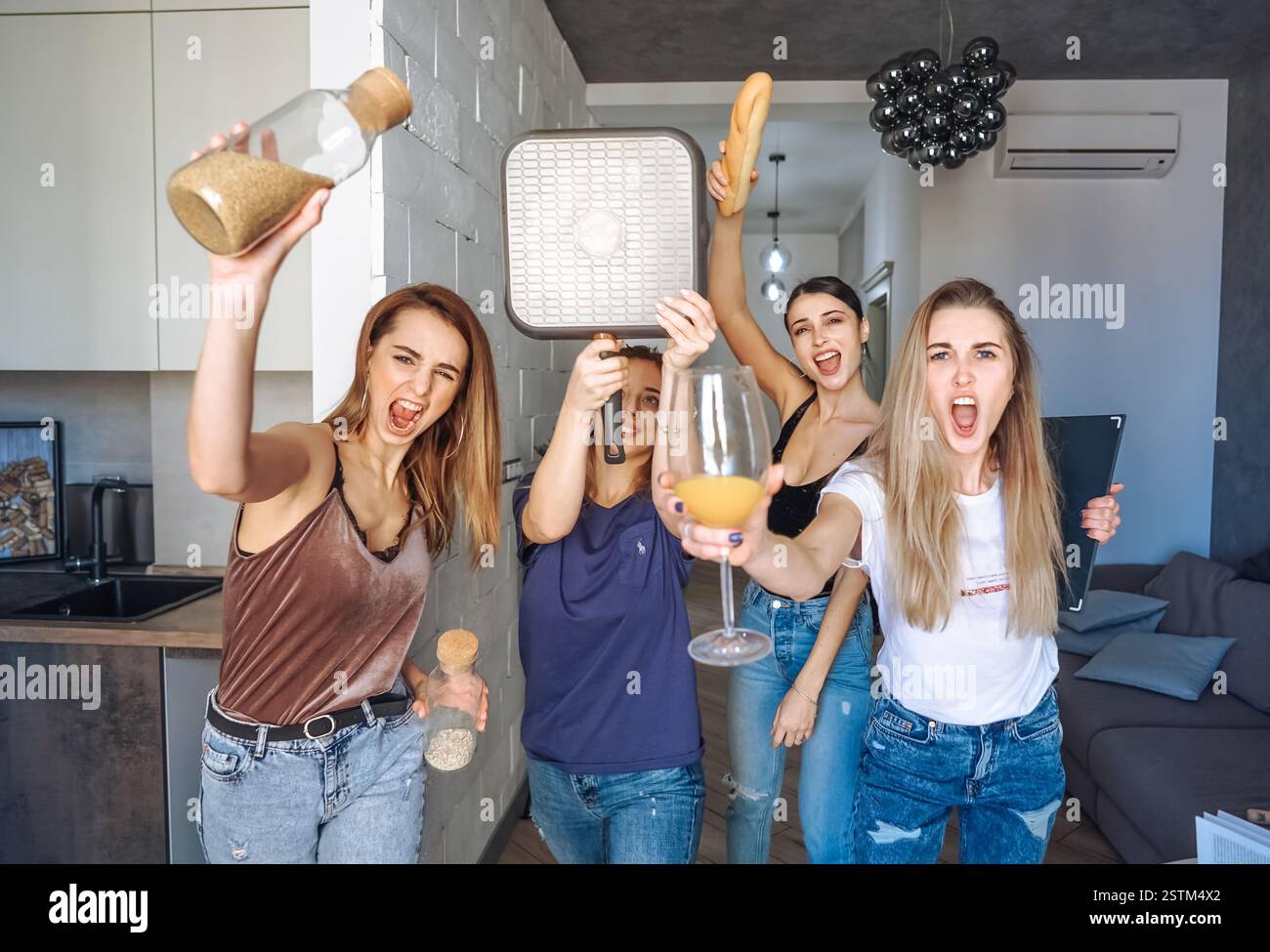 Cheerful group women dance in hi-res stock photography and images - Alamy