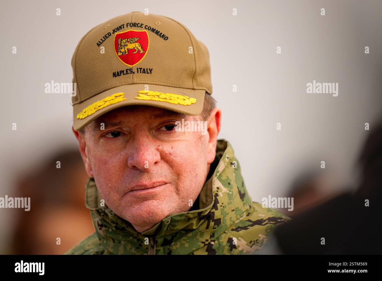 Admiral Stuart B. Munsch speaks to the press at the end of the ...