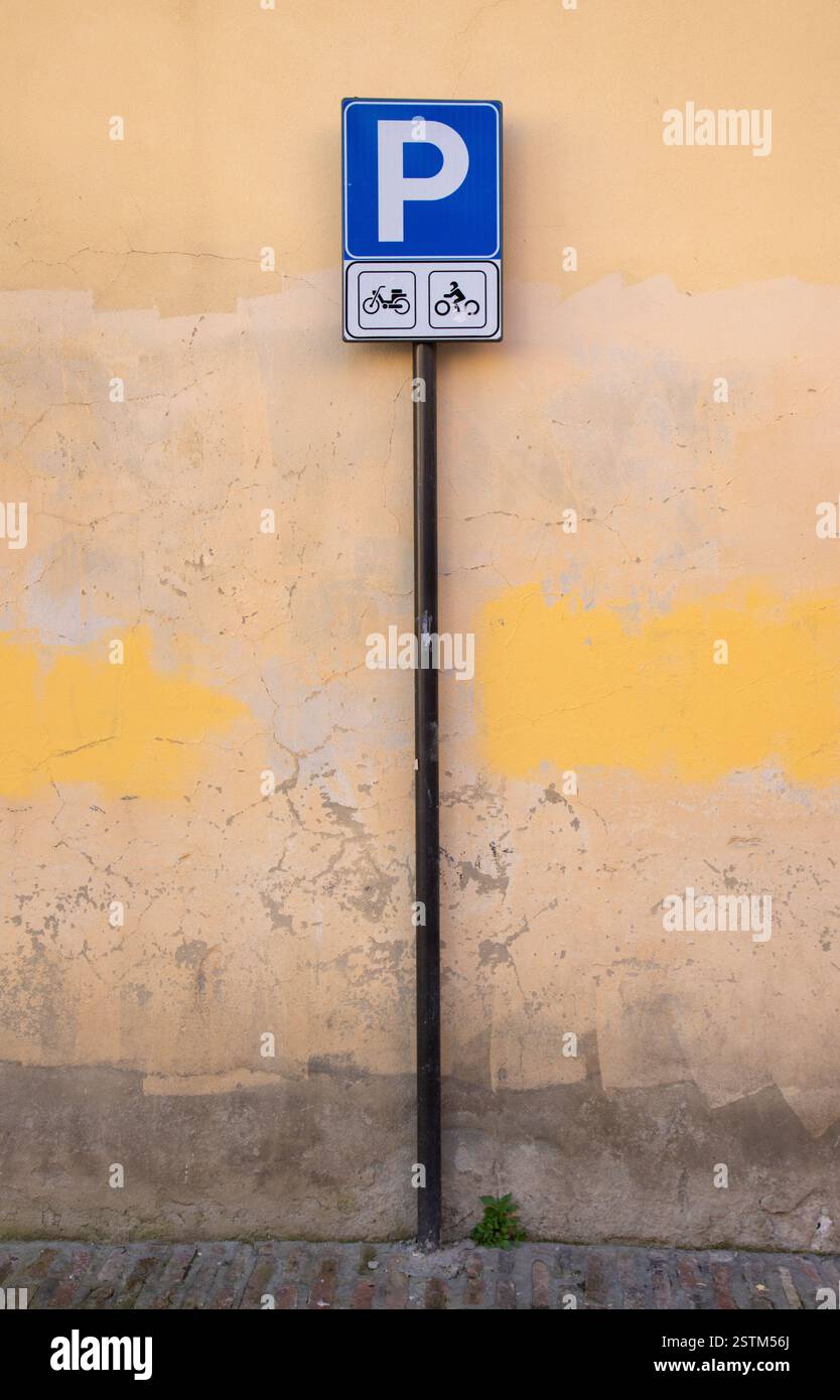 Official parking sign for bicycles and motorcycles, indicating ...