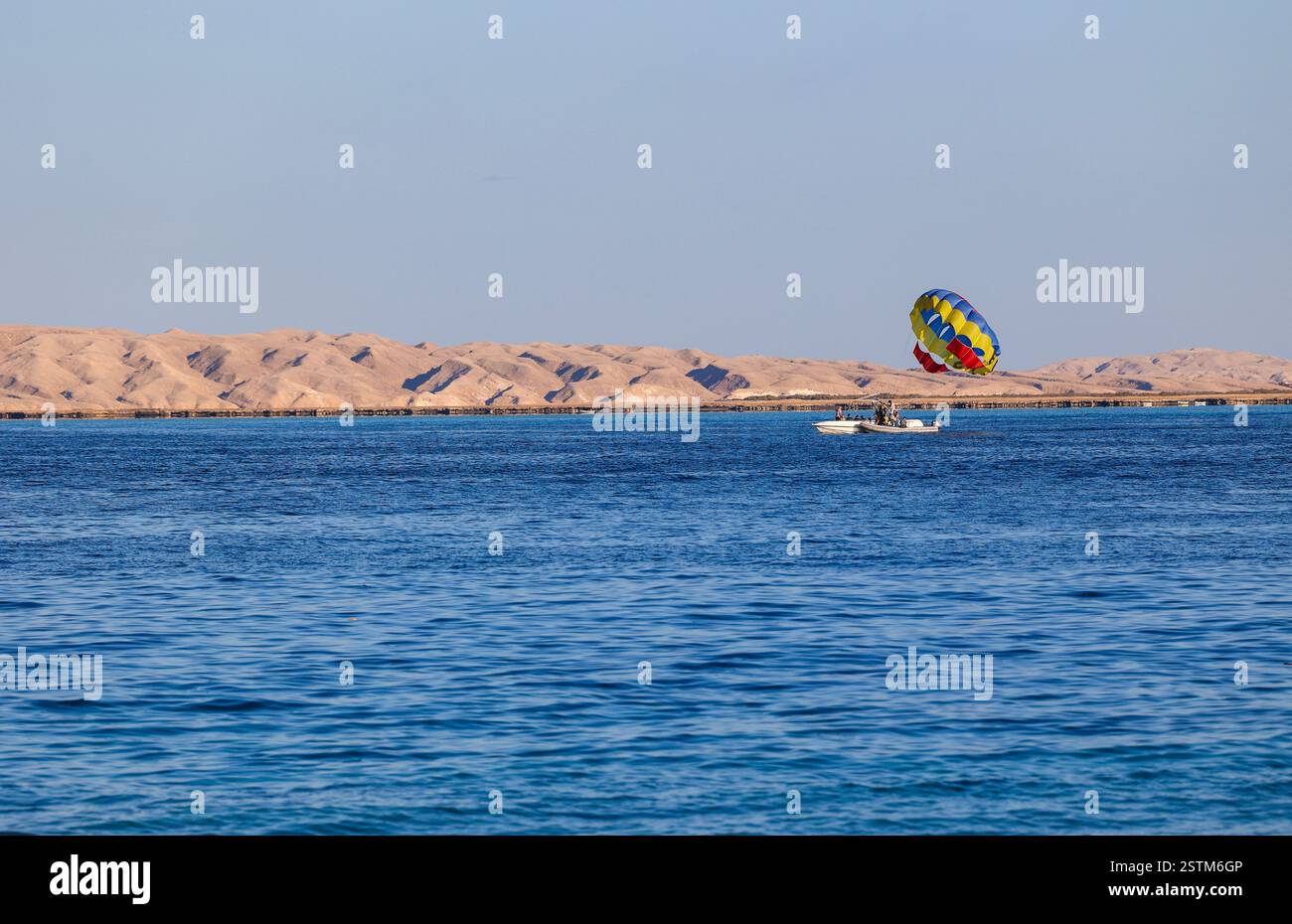 A motorboat with a parachute as a tourist attraction for visitors in ...