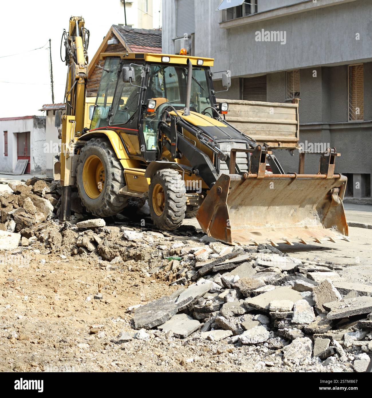 Backhoe loader machine street hi-res stock photography and images - Alamy