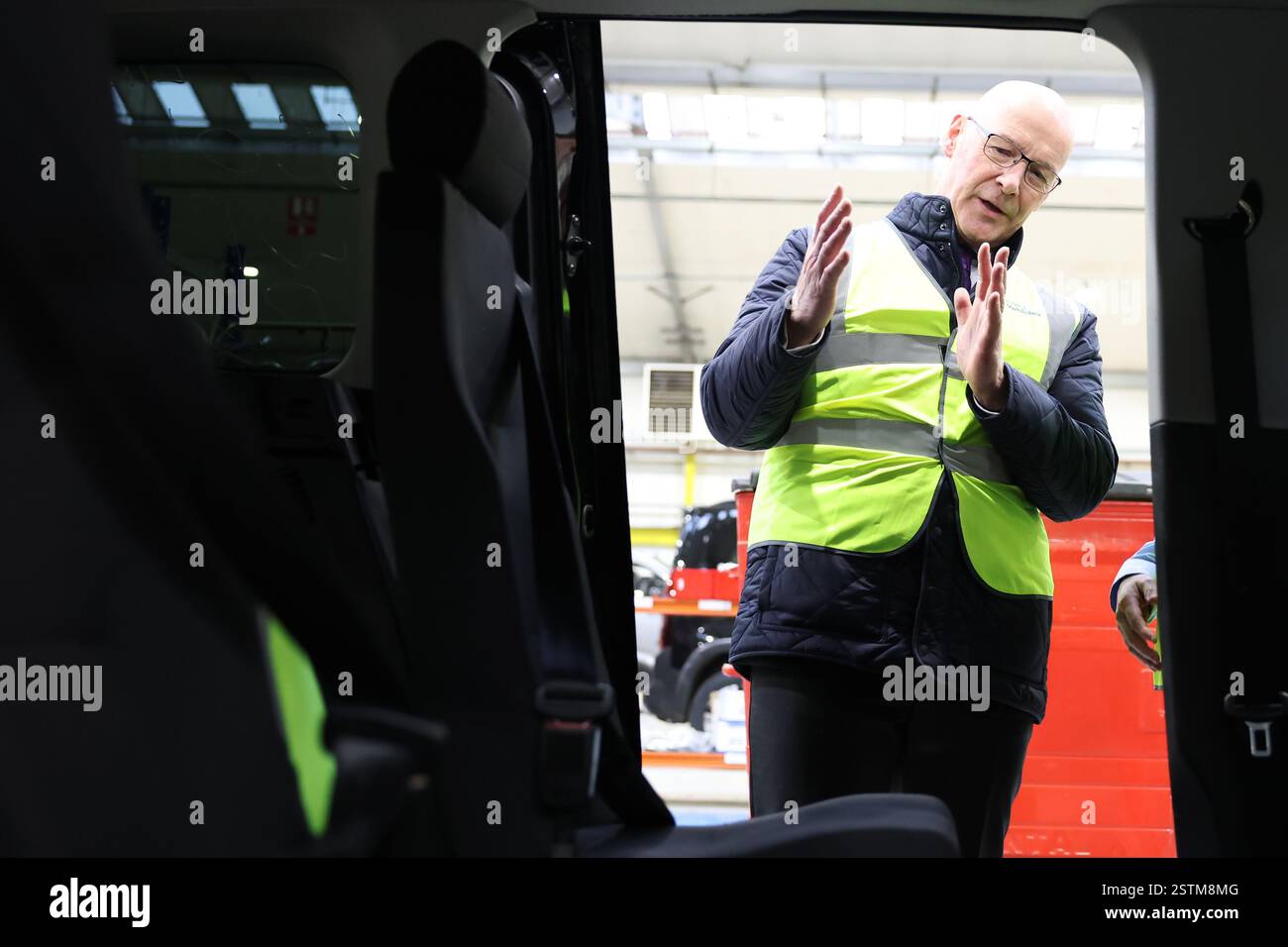 Scottish First Minister John Swinney views a Ford MAXiCab during his ...