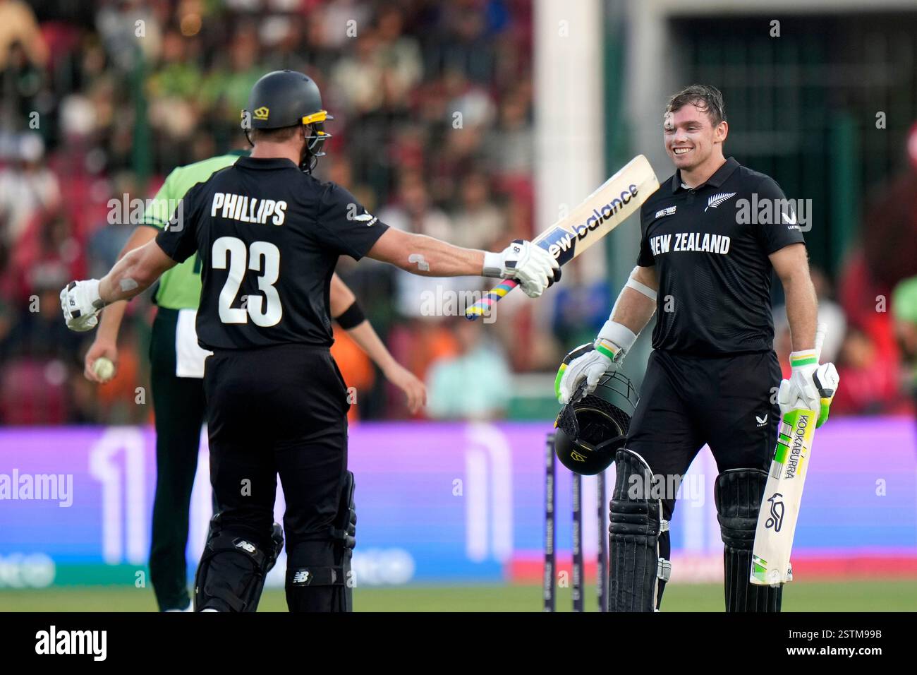 New Zealand's Tom Latham, right, celebrates with Glenn Phillips after ...