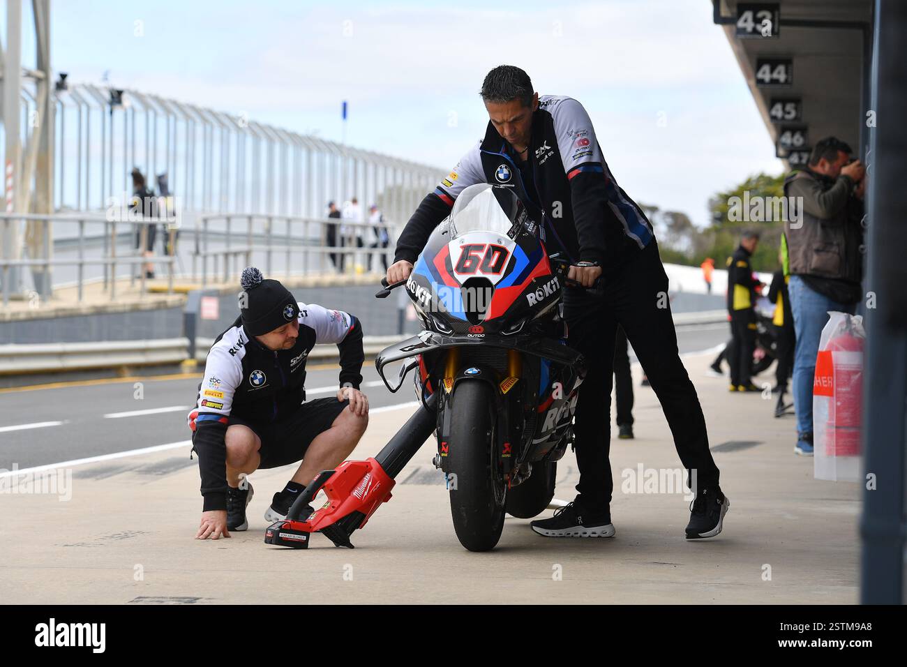 Mechanics work on bike of Michael VAN DER MARK World Superbike. Dutch ...
