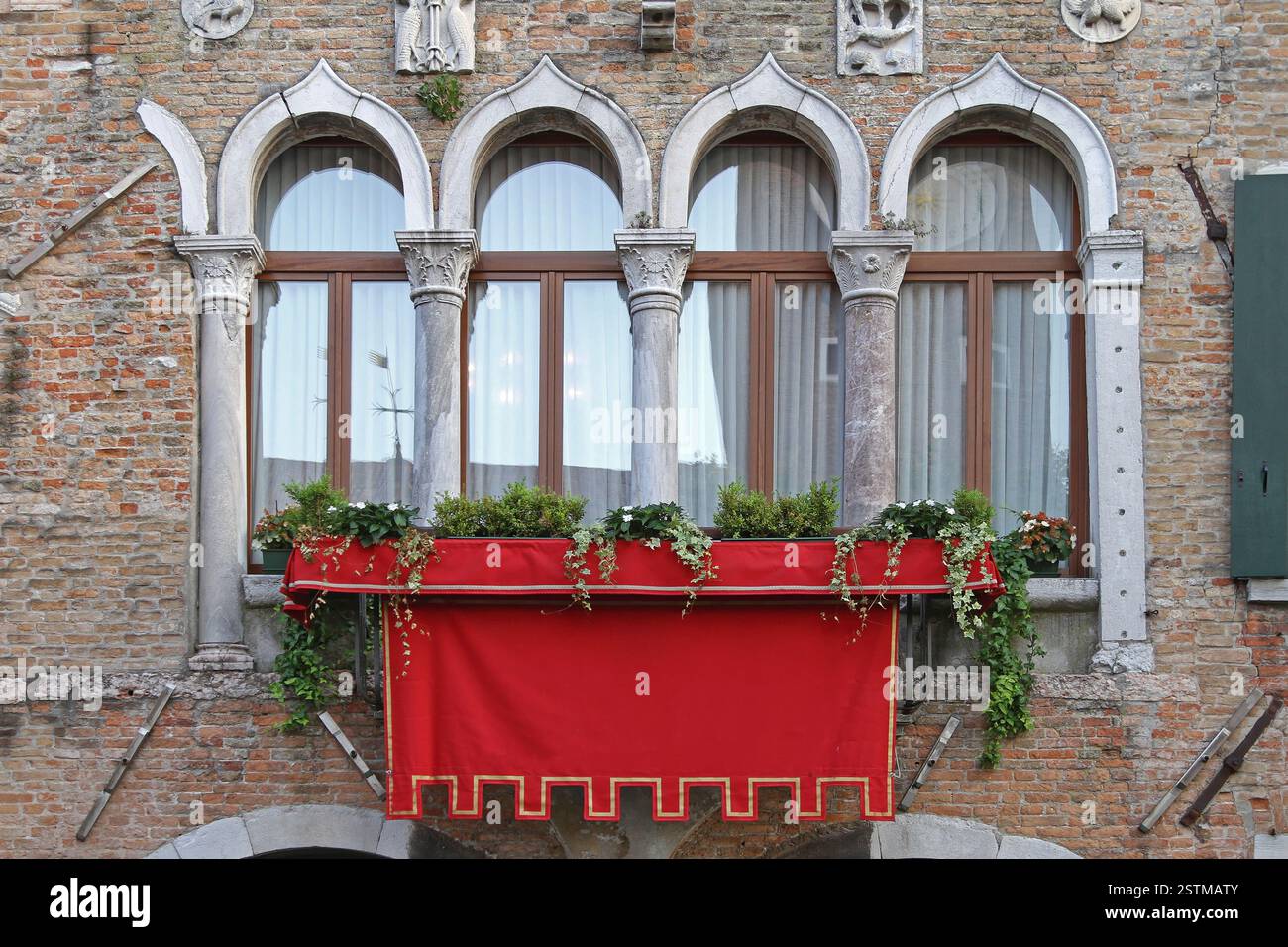 Arch windows at traditional building in venice italy hi-res stock ...