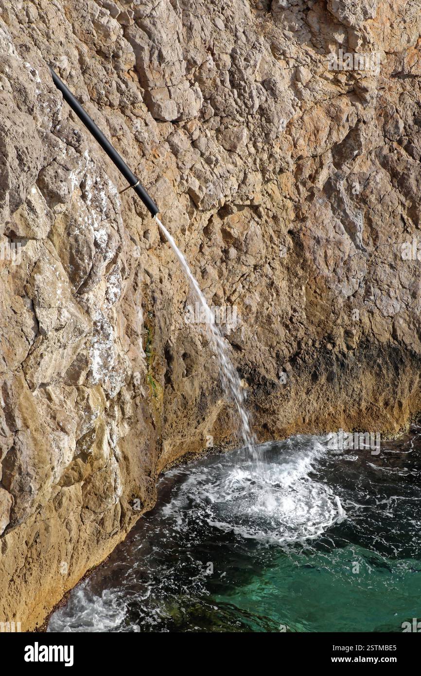 Pipe Drains in Sea Stock Photo - Alamy