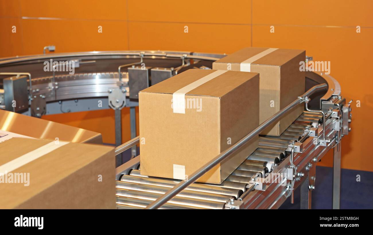 Conveyor belt and rollers for transfer boxes in factory hi-res stock ...
