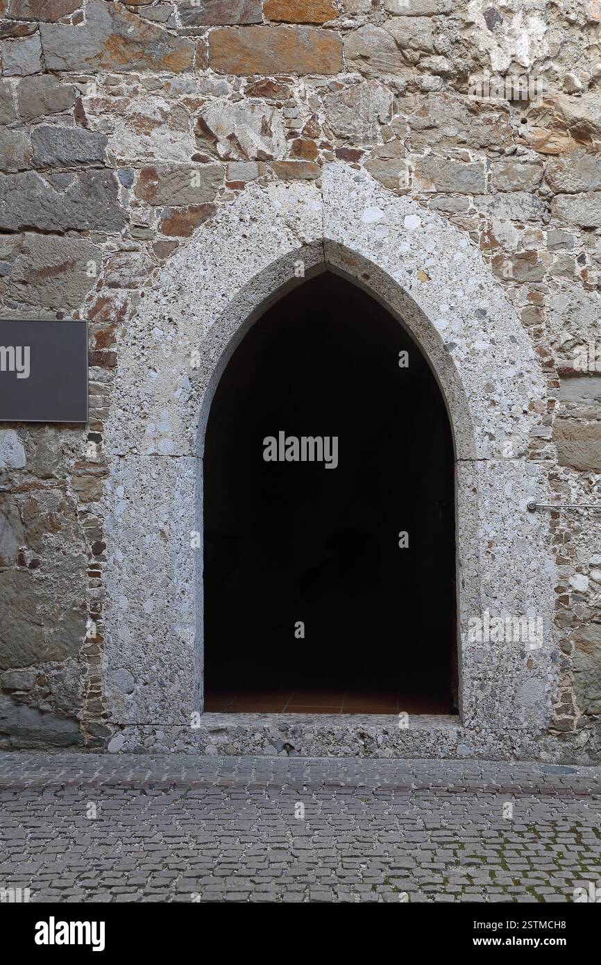 Small gothic stone arch chapel door exterior hi-res stock photography ...