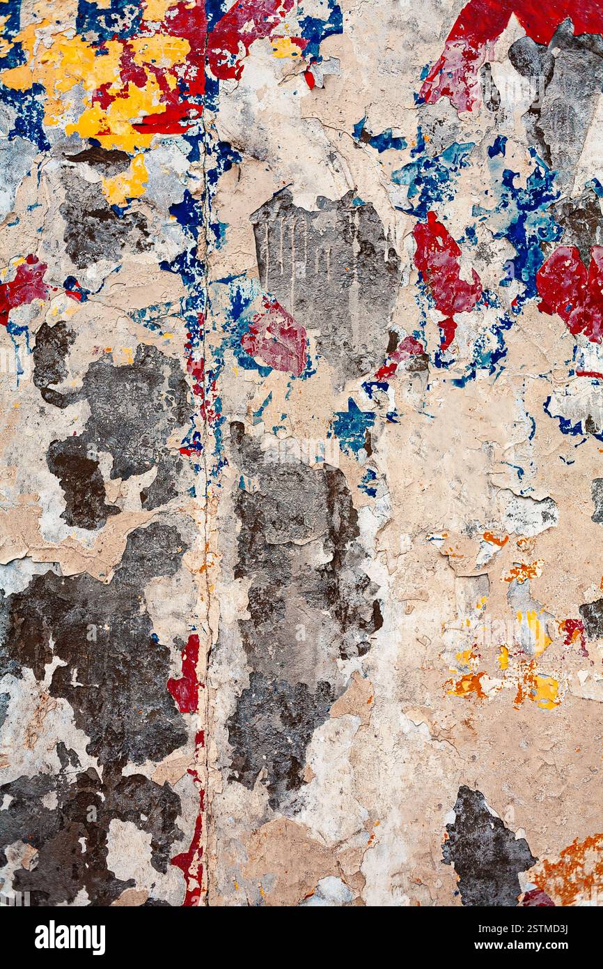 Old bumpy wall covered with scratches and messy color spots vertical ...