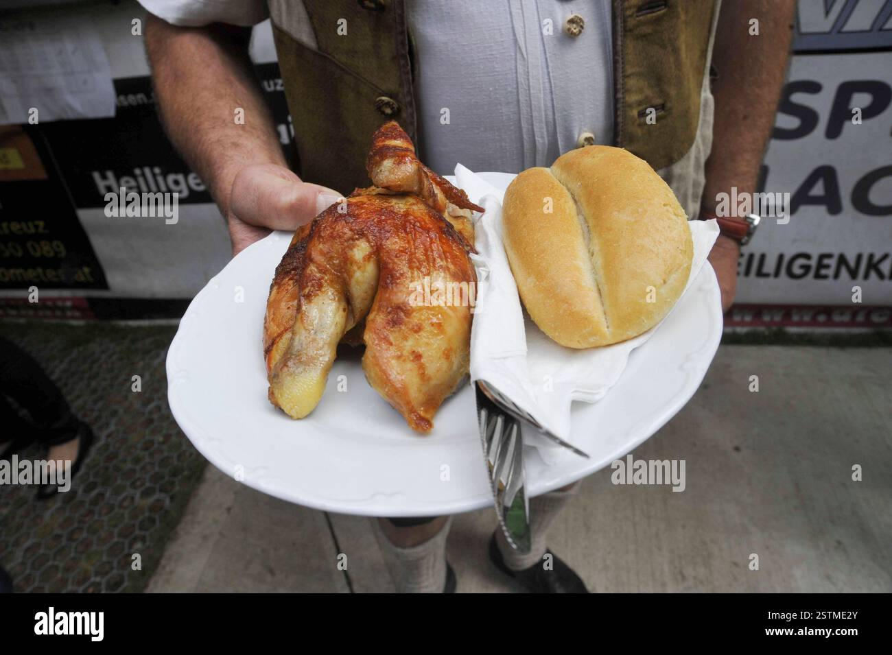 Roasted chicken at the snack bar, roased poultry from a rotary spit ...