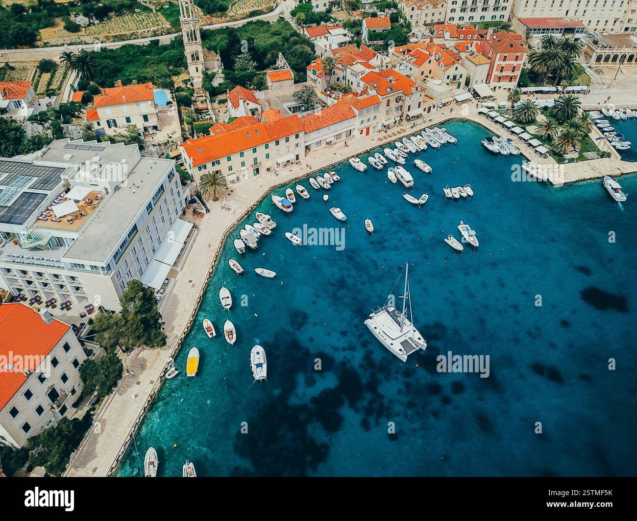 Aerial drone bird's eye view photo of picturesque port with sailboats ...