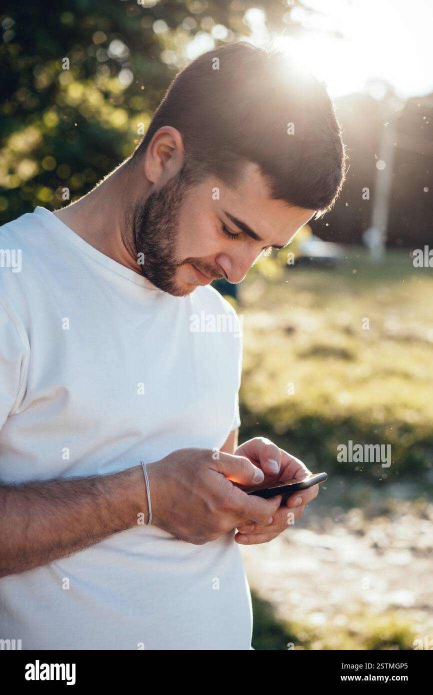 Smart handsome guy typing message hi-res stock photography and images ...