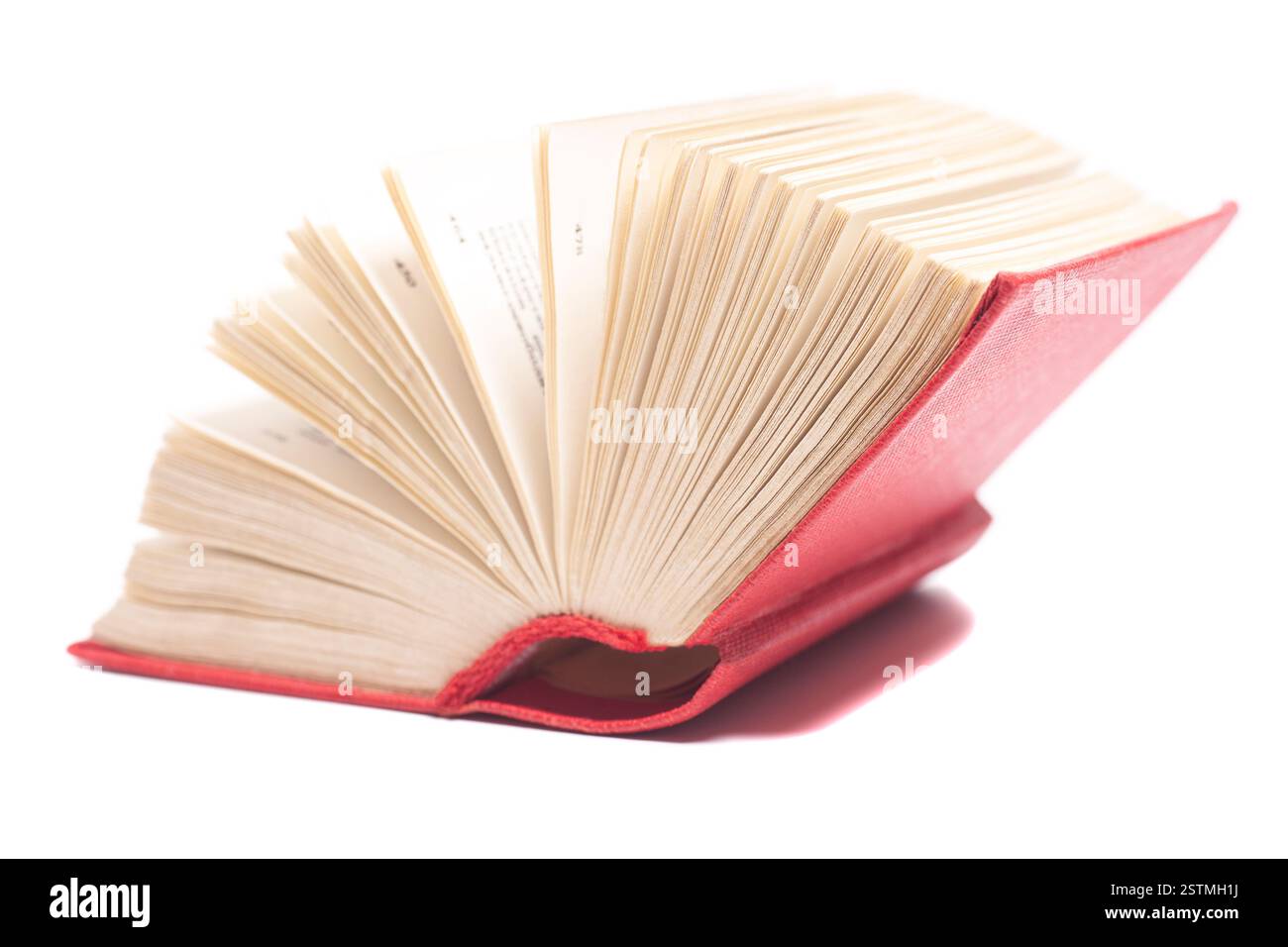 Open red book isolated on white background Stock Photo - Alamy