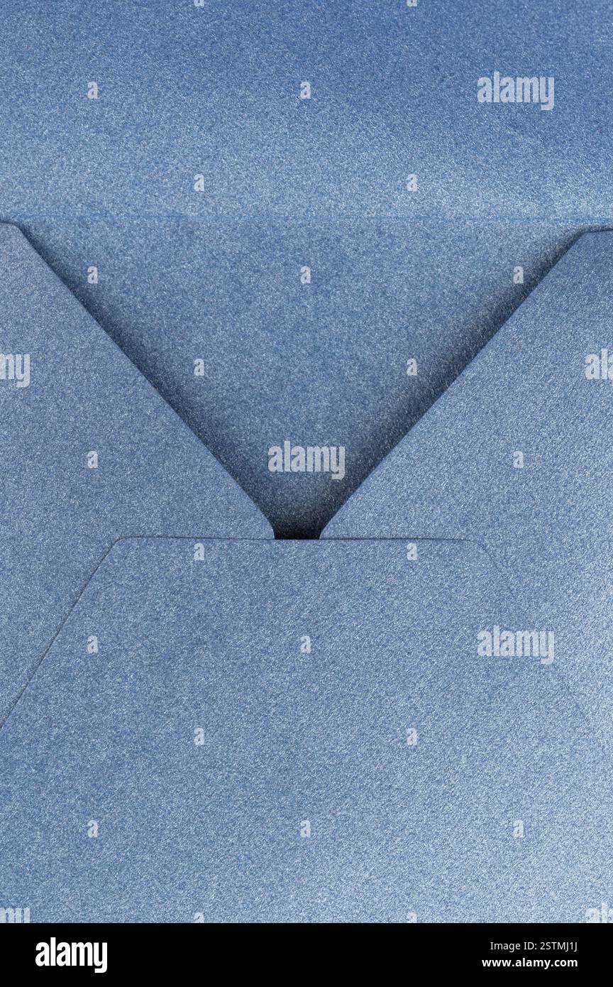 Modern blue envelope features sleek design with pointed flaps meeting at center, ideal for ...