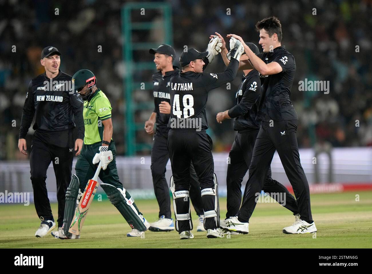 New Zealand's Will O' Rourke, right, celebrates with teammates after ...