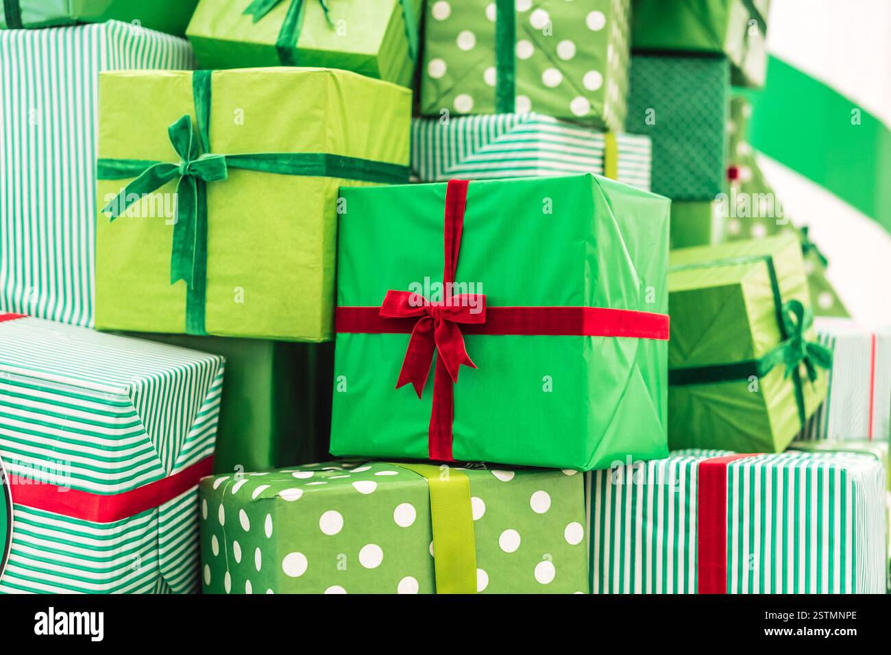 Photographs of many Christmas gifts of green color from close ...