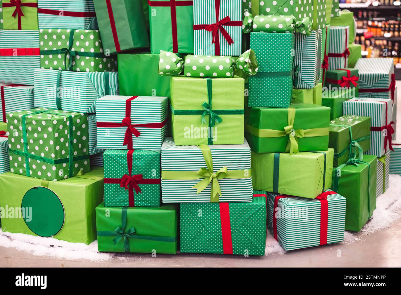 Photographs of many Christmas gifts of green color from close ...