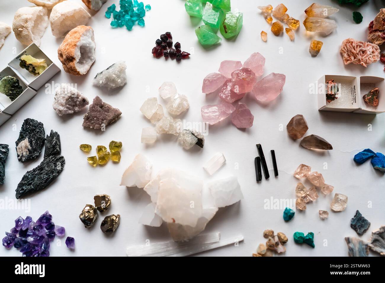Collection of beautiful precious stones on white table Stock Photo - Alamy