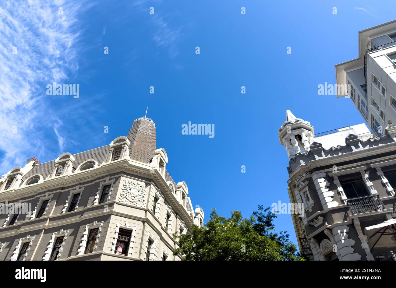 Ornate classic buildings, colonial architecture on blue sky, under view ...