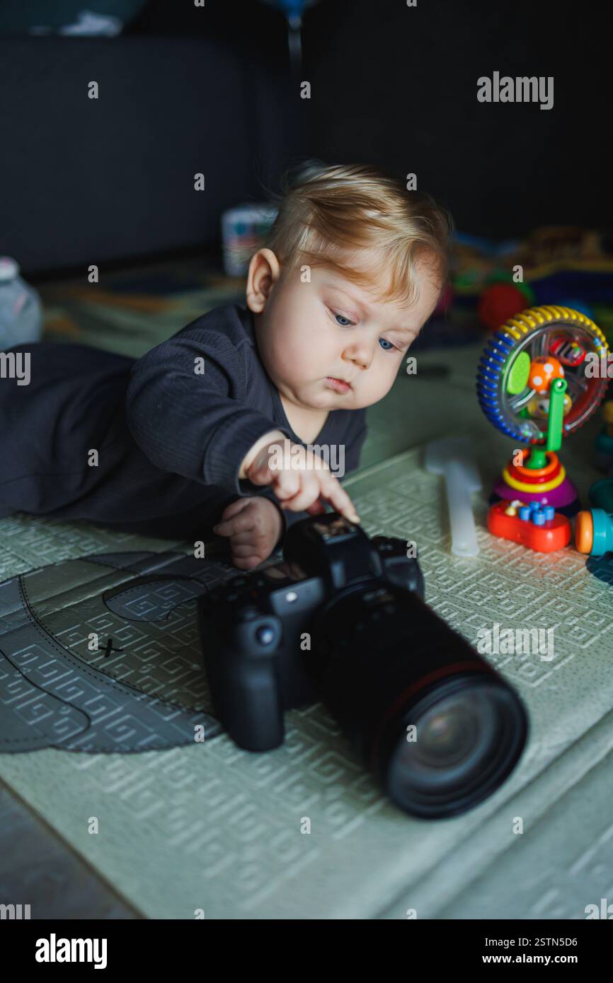 Baby reaching camera curious exploration hi-res stock photography and ...