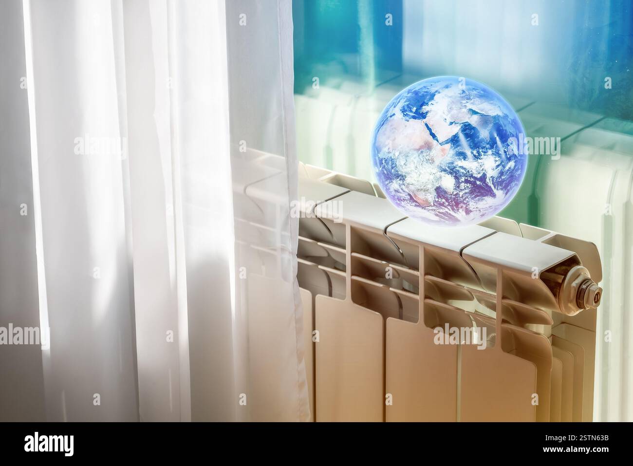 Creative photo collage featuring Earth on a heating radiator ...