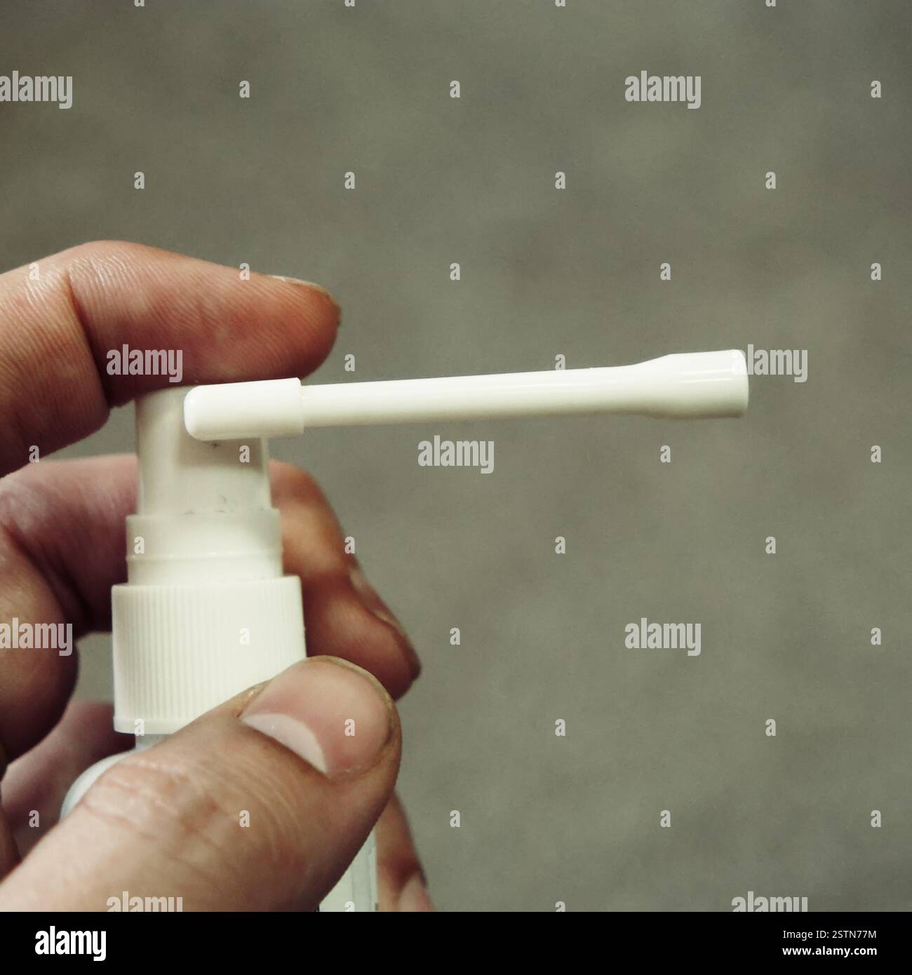 Person with spray inhaler in hand and copy space hi-res stock ...