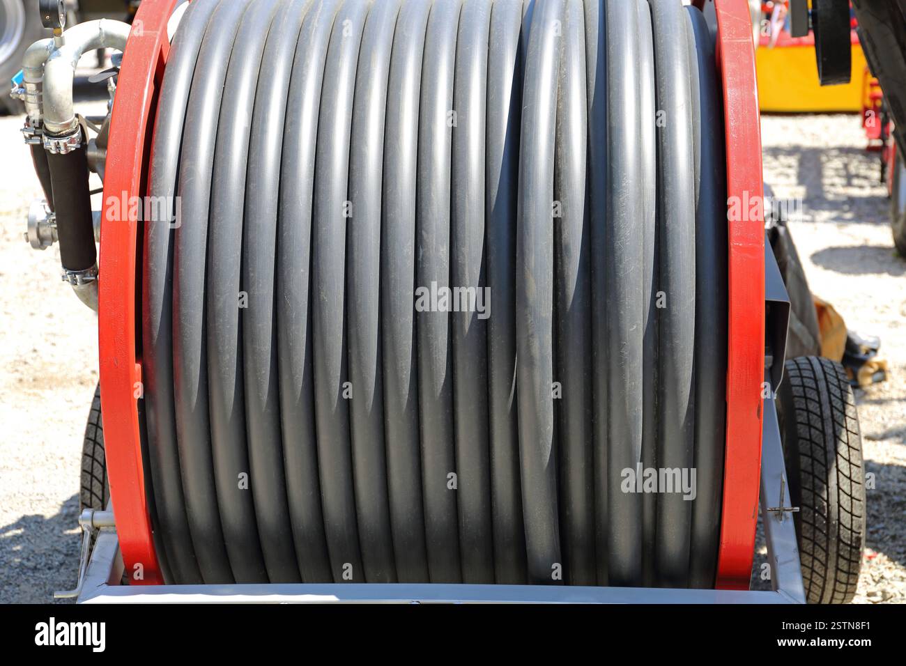 Plastic pipe hose at coil trailer for water irrigation hi-res stock ...