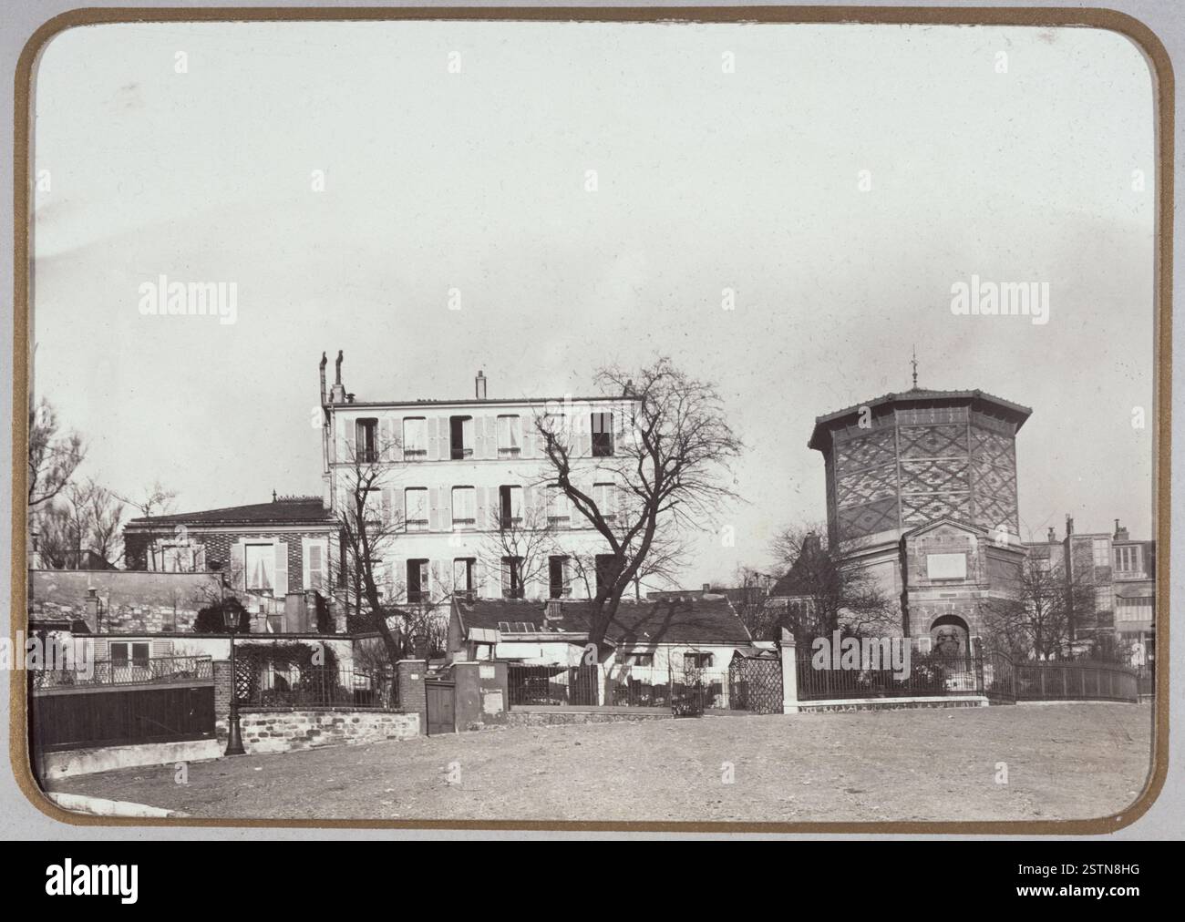 A 1904 photograph by René Audra showing the reservoir on Rue Lepic in ...
