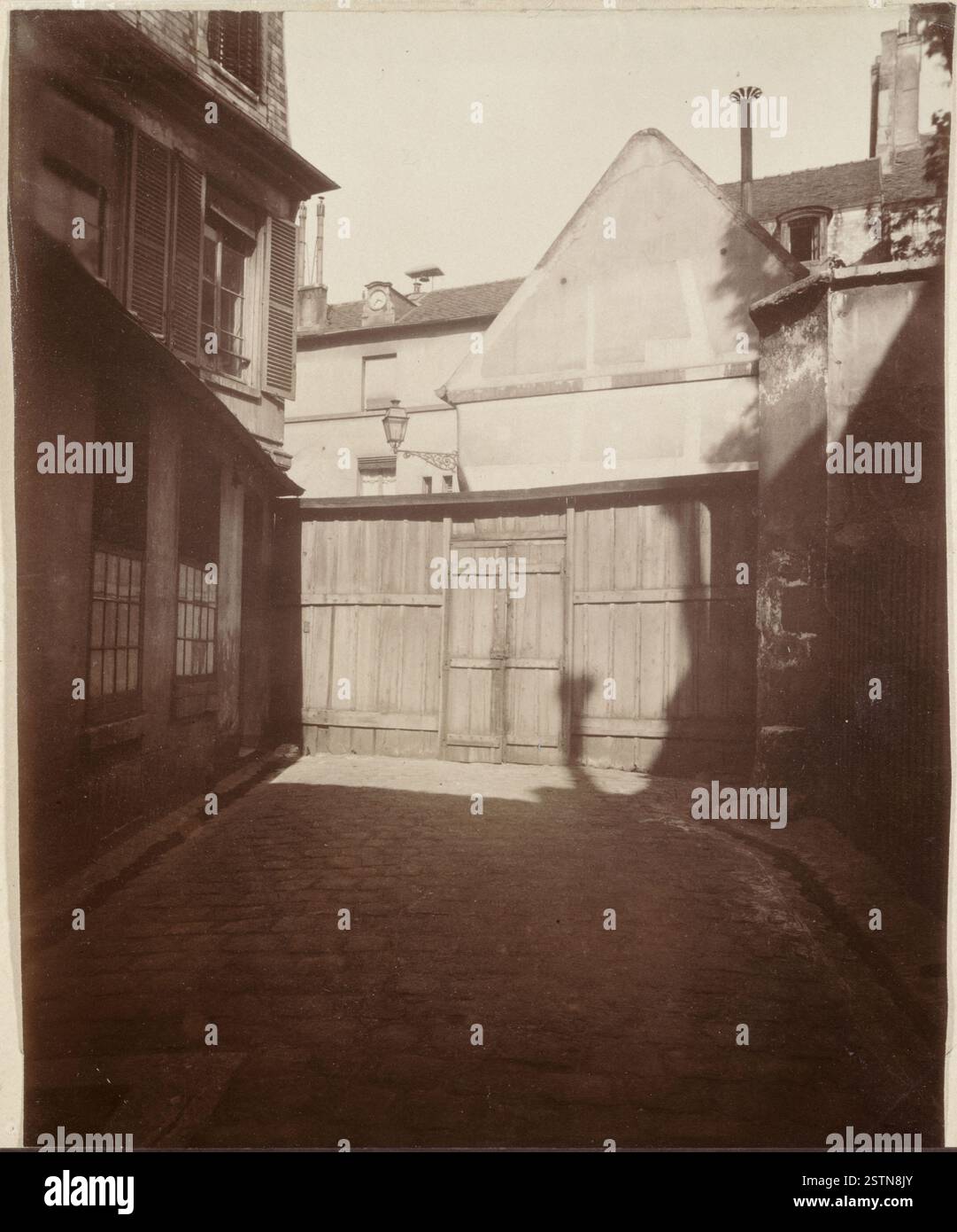 Photograph by Eugène Atget, taken in 1901, depicting a street or area ...