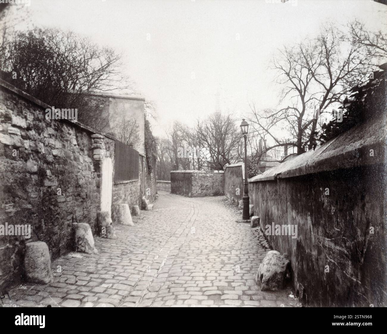 A photograph by Eugène Atget from his 'Topography' series, capturing ...