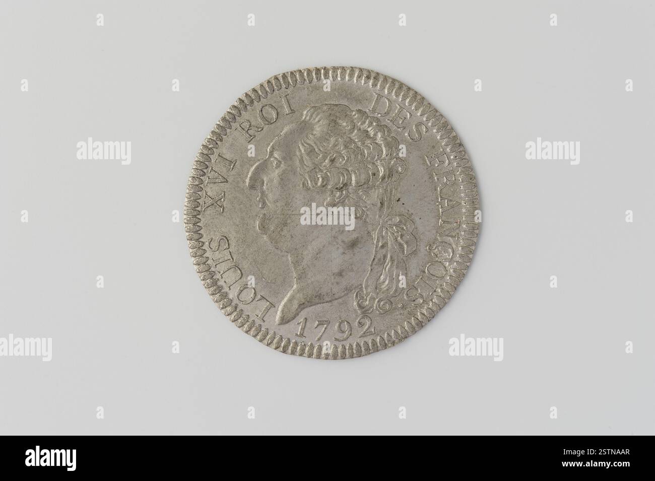 A 1792 engraving by Augustin Dupré showcasing a left-facing portrait of ...