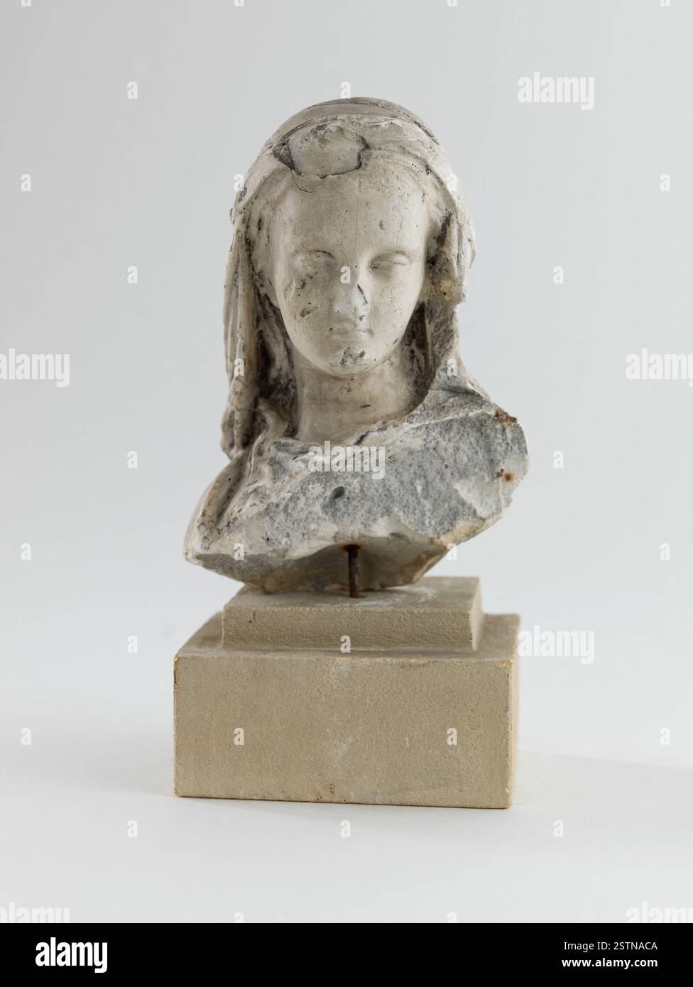 This 1923 sculpture of the veiled Virgin Mary depicts her in a serene ...