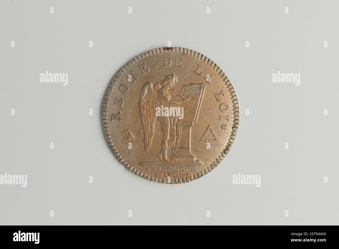 A 1791 medal by Augustin Dupré, featuring an angelic figure engraving ...