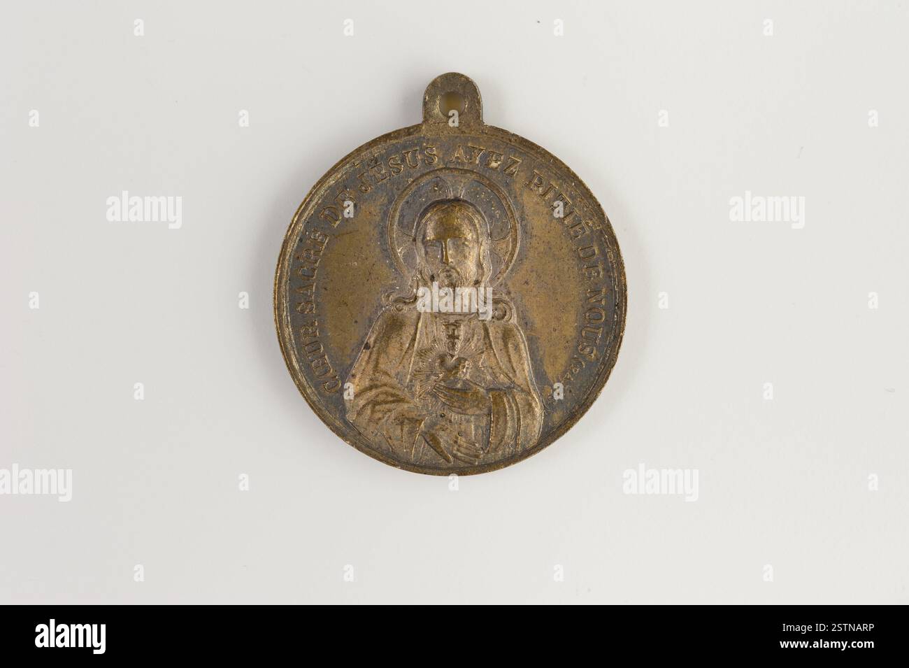 This 1875 anonymous medal features a mid-bust depiction of Jesus Christ ...