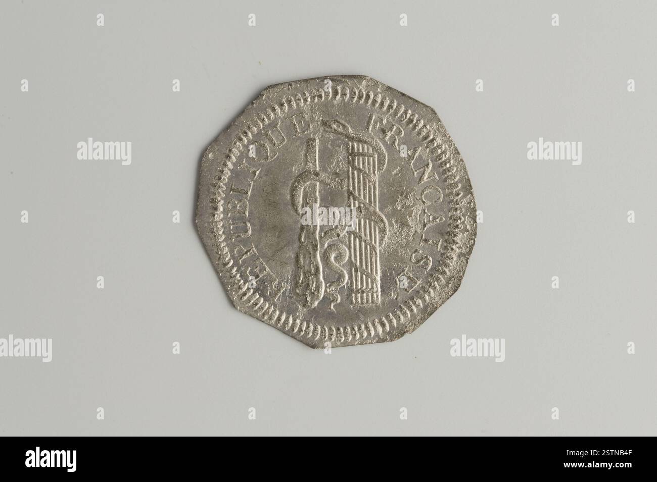 A 1795 medal by Augustin Dupré depicting a serpent coiled around a club ...