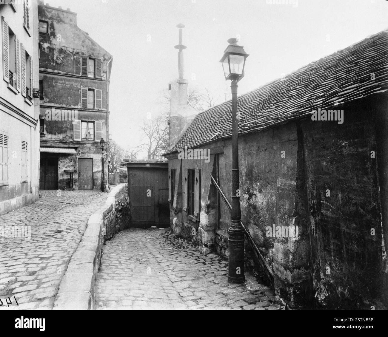 A photograph by Eugène Atget from his 'Topography' series, capturing ...