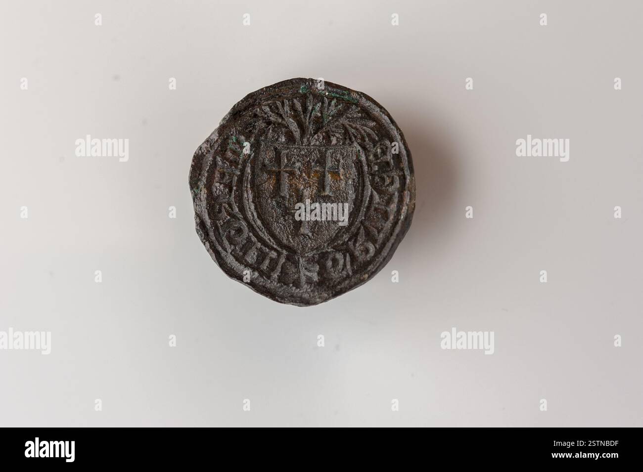 13th-century French coin featuring a shield with three crossed pattée ...