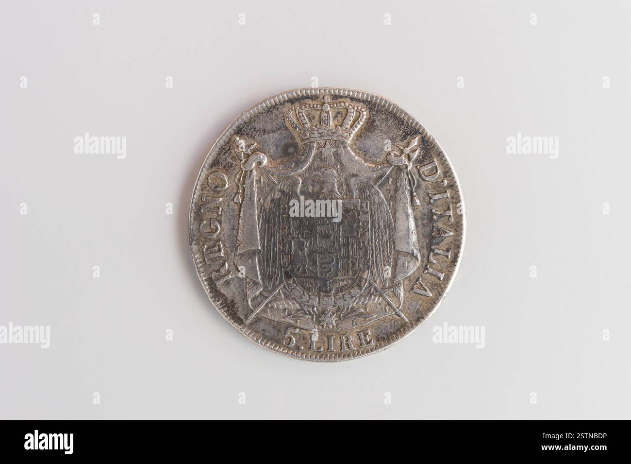 This 1809 coin depicts Napoleon’s head on the obverse, with the arms of ...