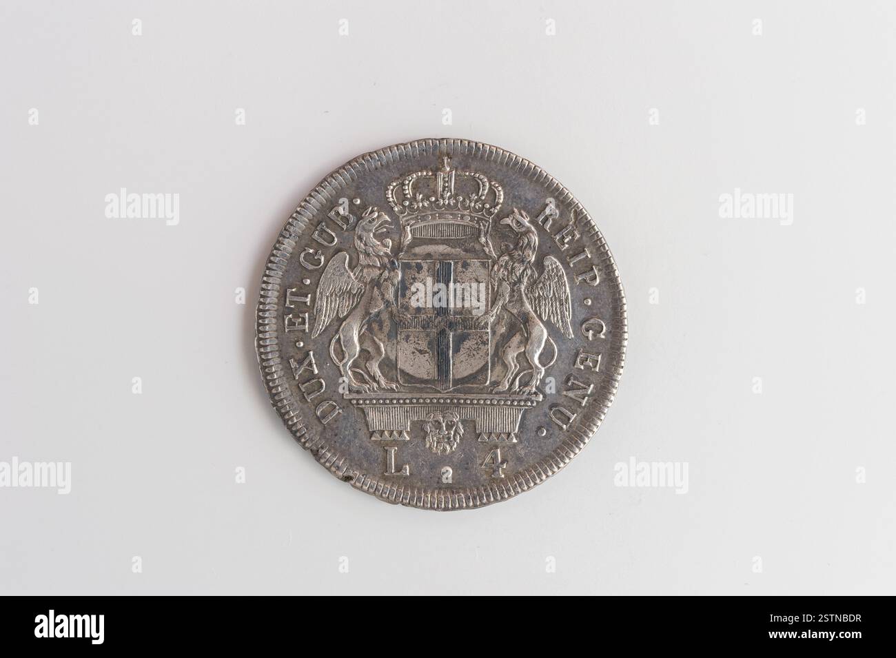 This 1795 coin features the arms of Genoa supported by griffins, with a ...