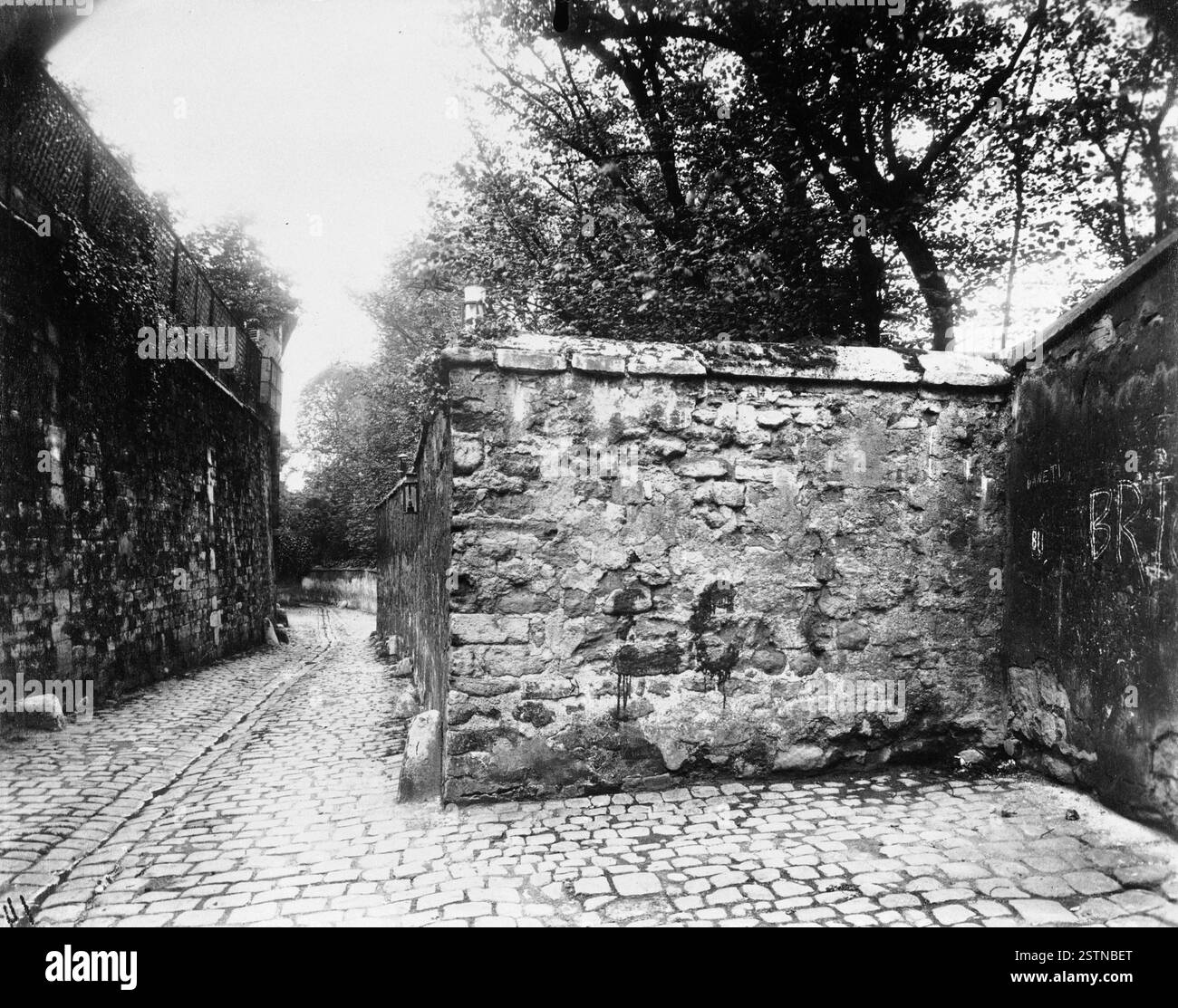 A photograph by Eugène Atget from his 'Topography' series, capturing ...
